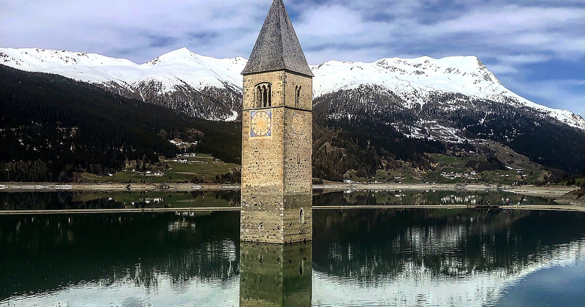 Lake Reschen in Alps, Italy | Tripomatic